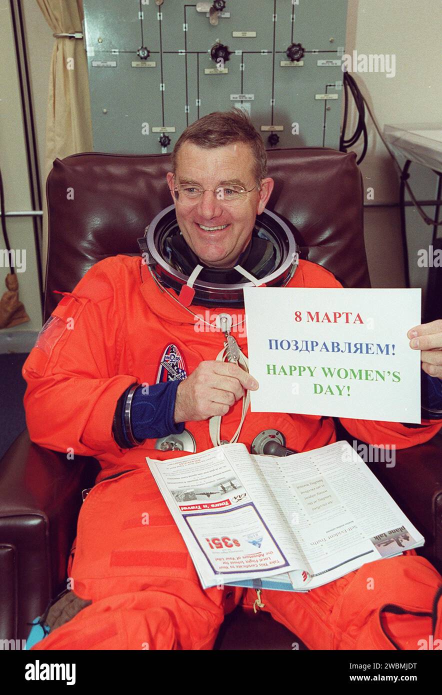 Mission Specialist James Voss, suiting up at Kennedy Space Center ...
