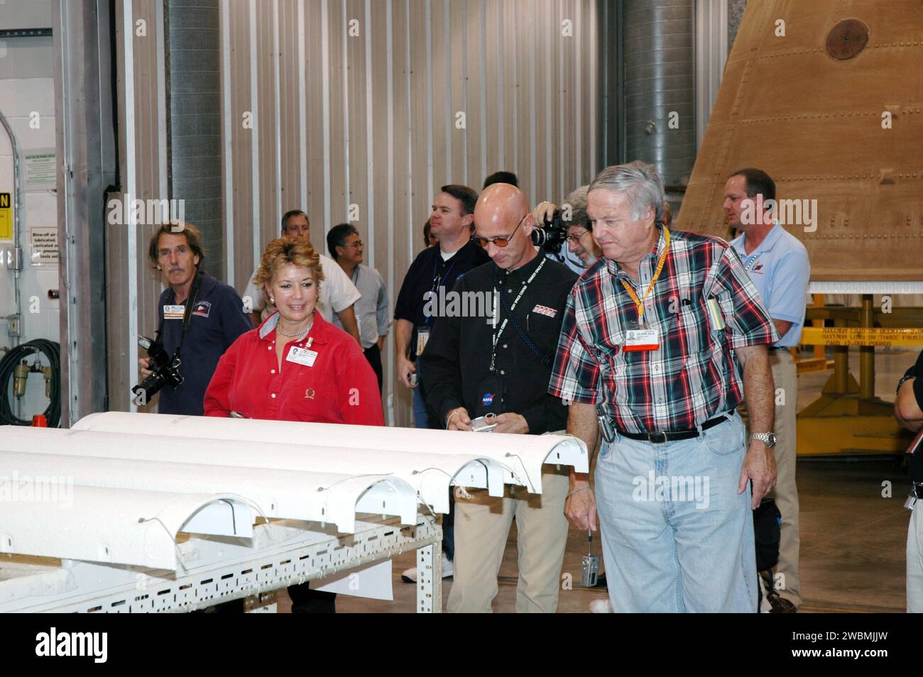 KENNEDY SPACE CENTER, FLA. - The media are shown parts of Solid Rocket ...
