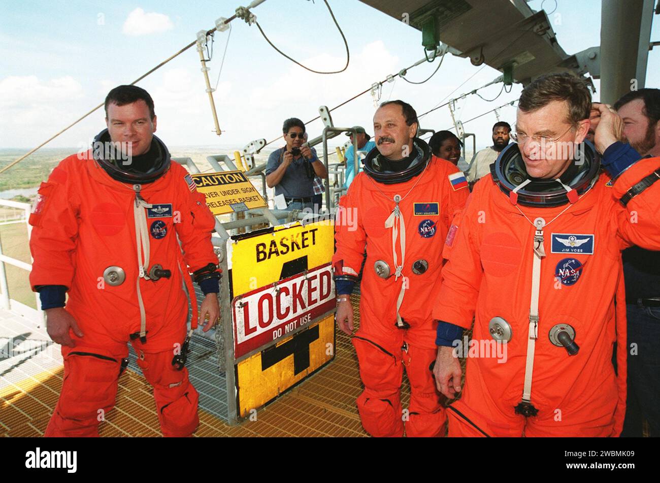 At the 195-foot level on the Fixed Service Structure, Launch Pad 39B, members of the STS-102 ...