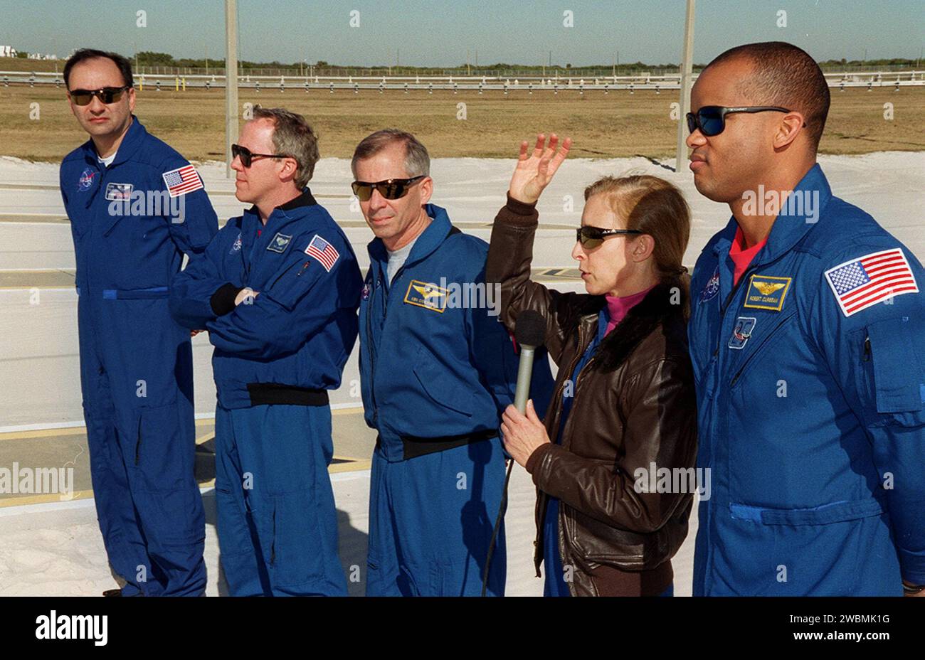 STS-98 crew demonstrates use of the robotic arm to lift and attach the ...
