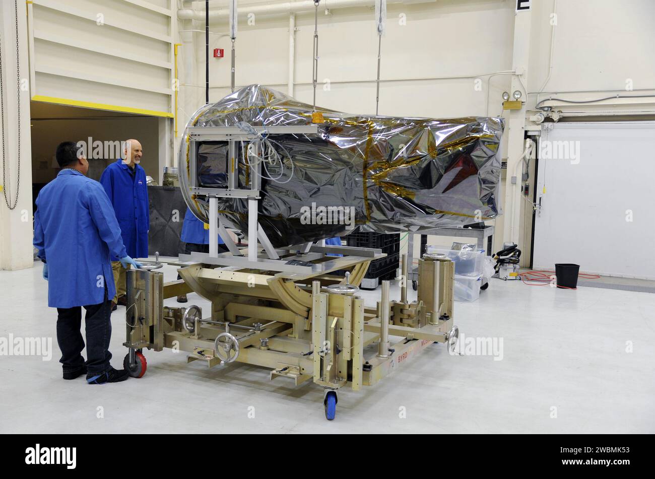 VANDENBERG AFB, Calif. – Technicians connect NASA's IRIS spacecraft to ...