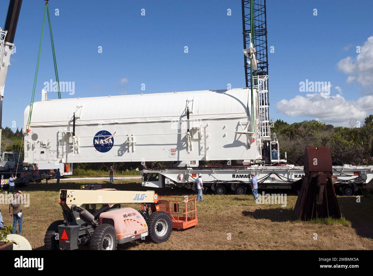CAPE CANAVERAL, Fla. -- Cranes lift payload canister #1 from the ...