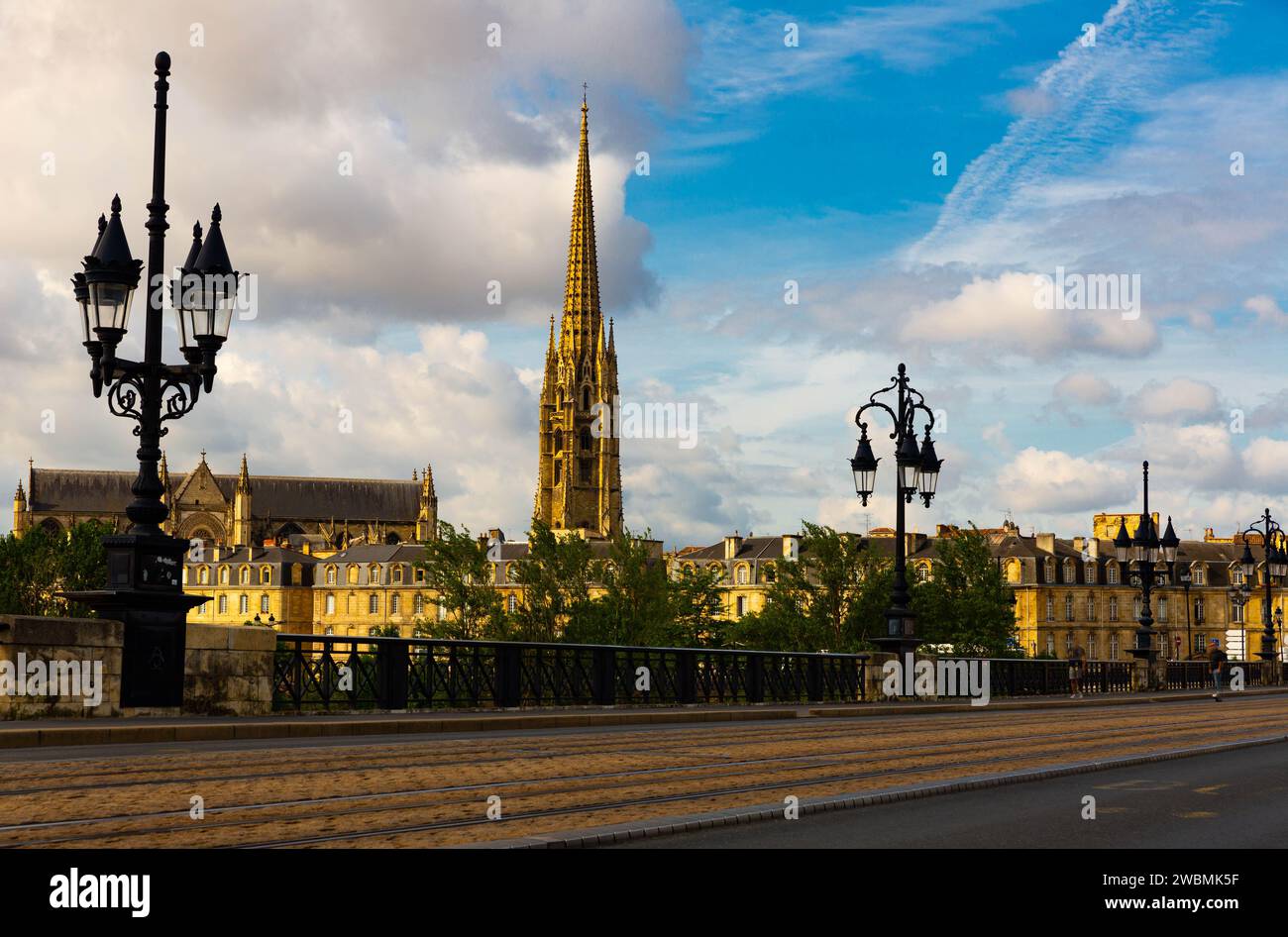 Bordeaux river bridge with St Michel cathedral. France Stock Photo - Alamy