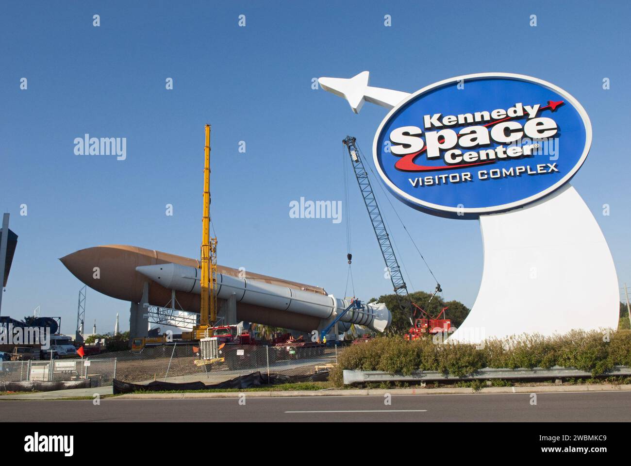 CAPE CANAVERAL, Fla. – Cranes remove a full-size, 149-foot-long, space ...