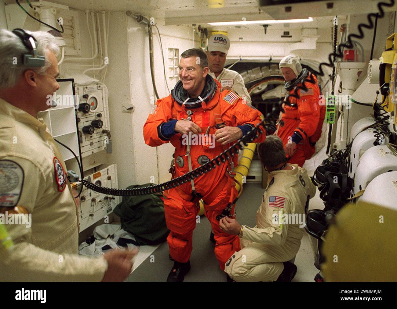 STS-102 Mission Specialist James Voss prepared his launch and entry ...