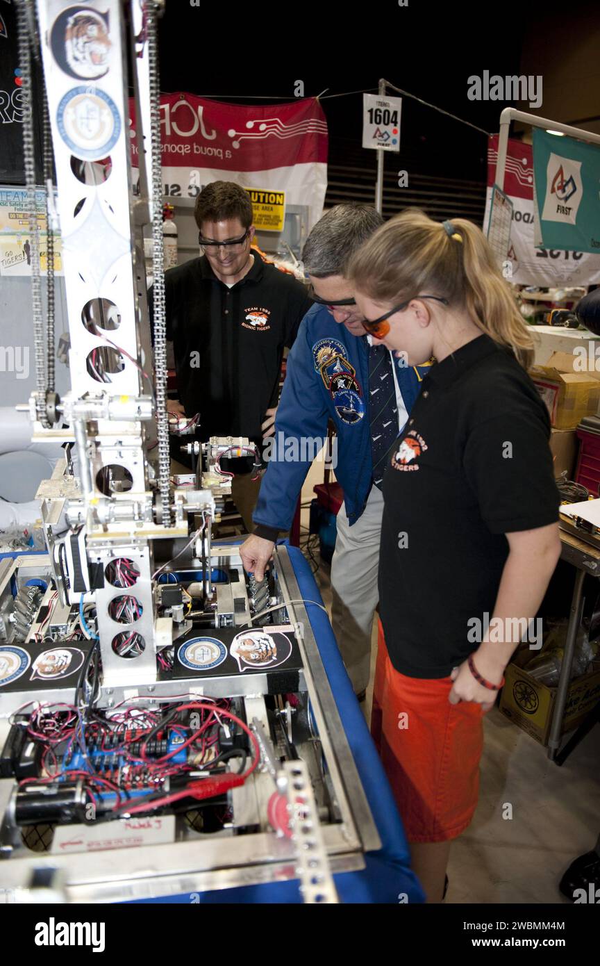 ORLANDO, Fla. – NASA Kennedy Space Center Director Bob Cabana checks ...