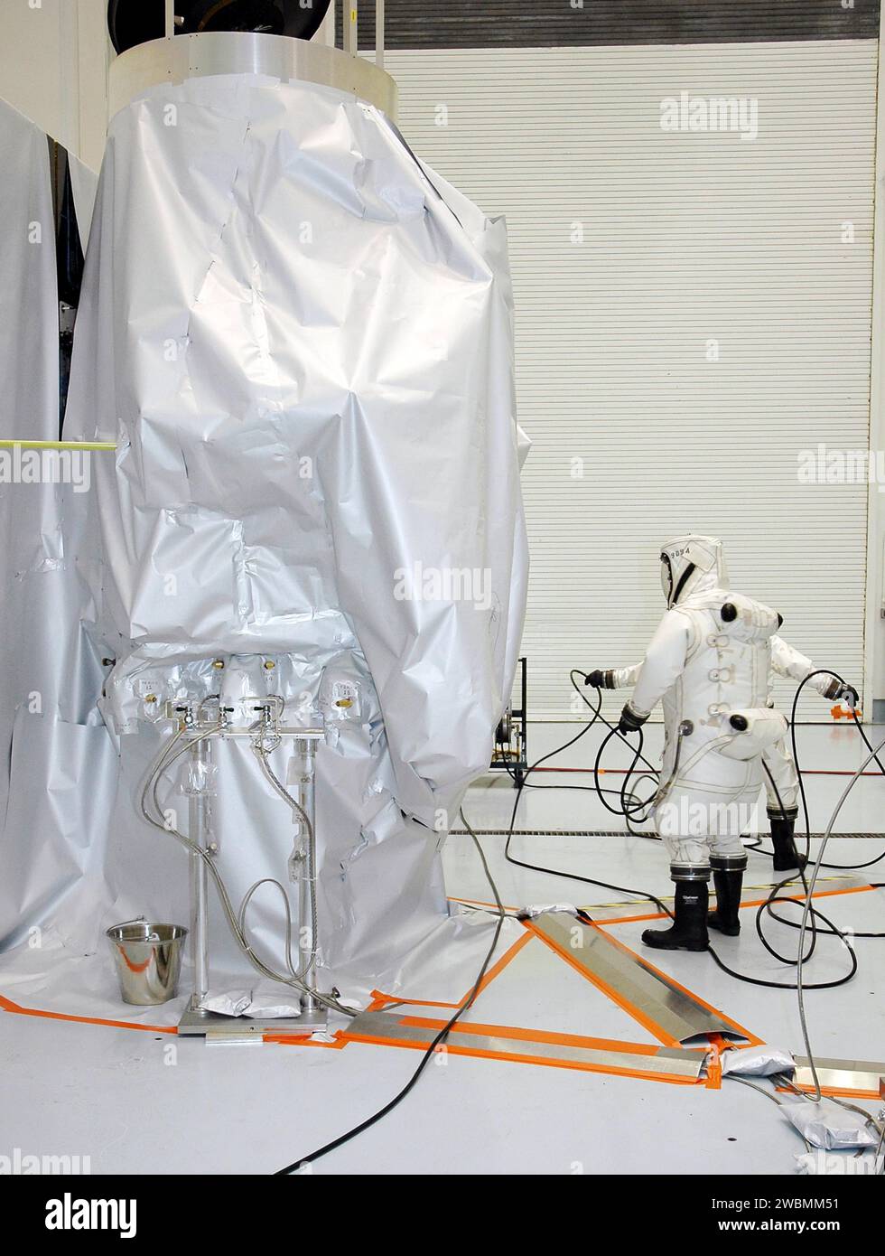 At Astrotech Space Operations, workers prepared the Deep Impact ...