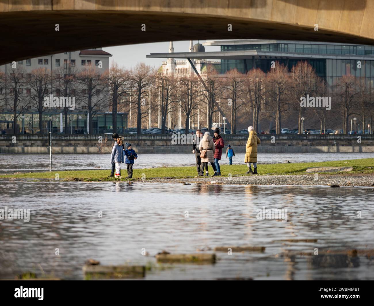 People on the Elbe cycle path in Dresden looking at the water levels ...