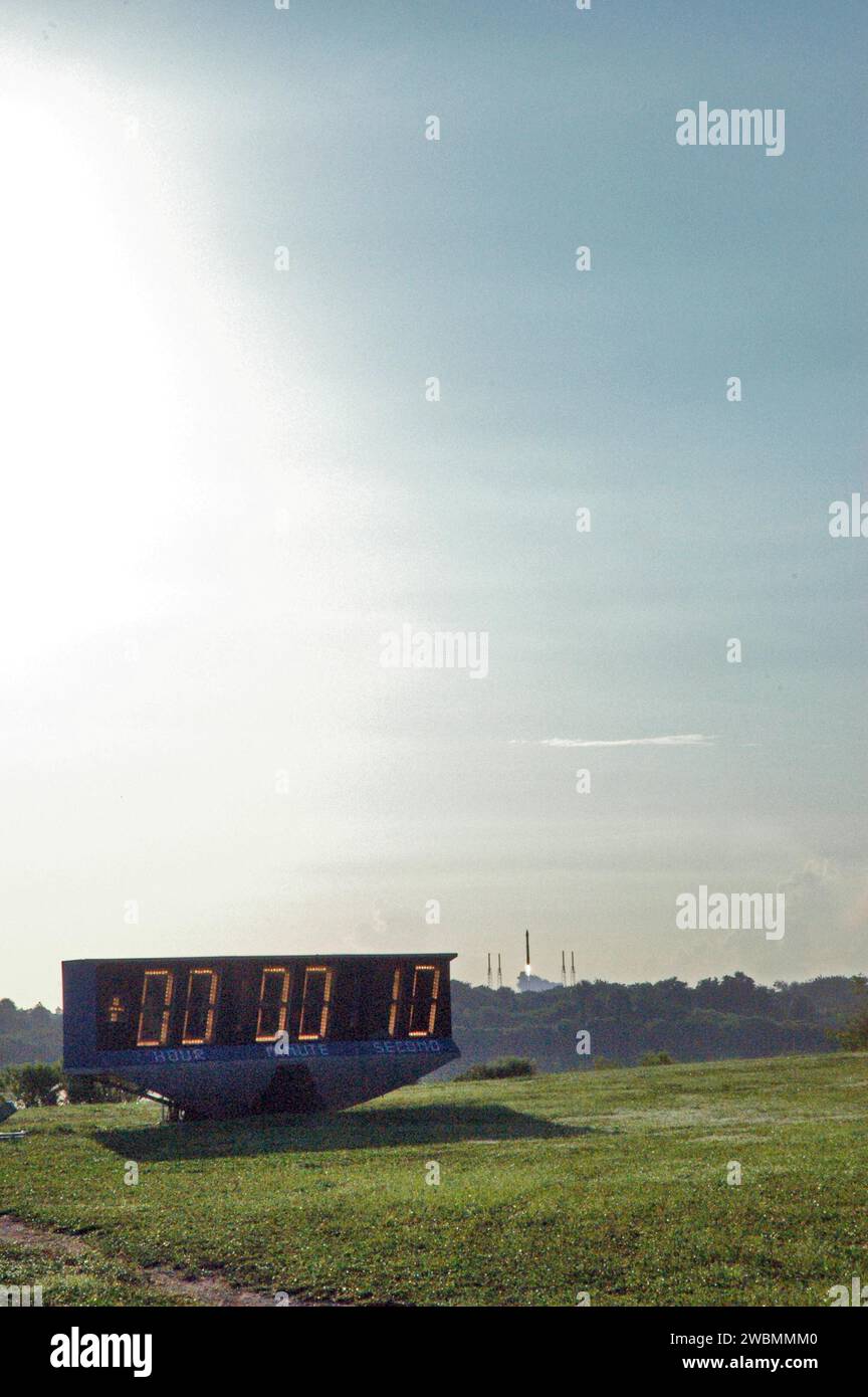 KENNEDY SPACE CENTER, FLA. - Seen on the horizon just past the NASA ...