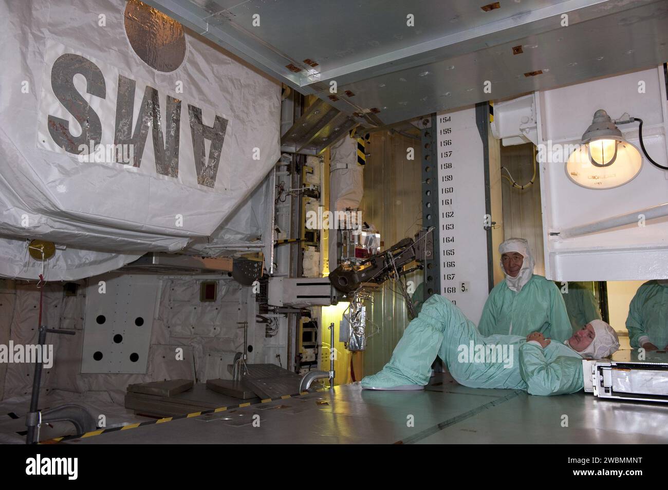 CAPE CANAVERAL, Fla. -- STS-134 Commander Mark Kelly, lying down, and ...
