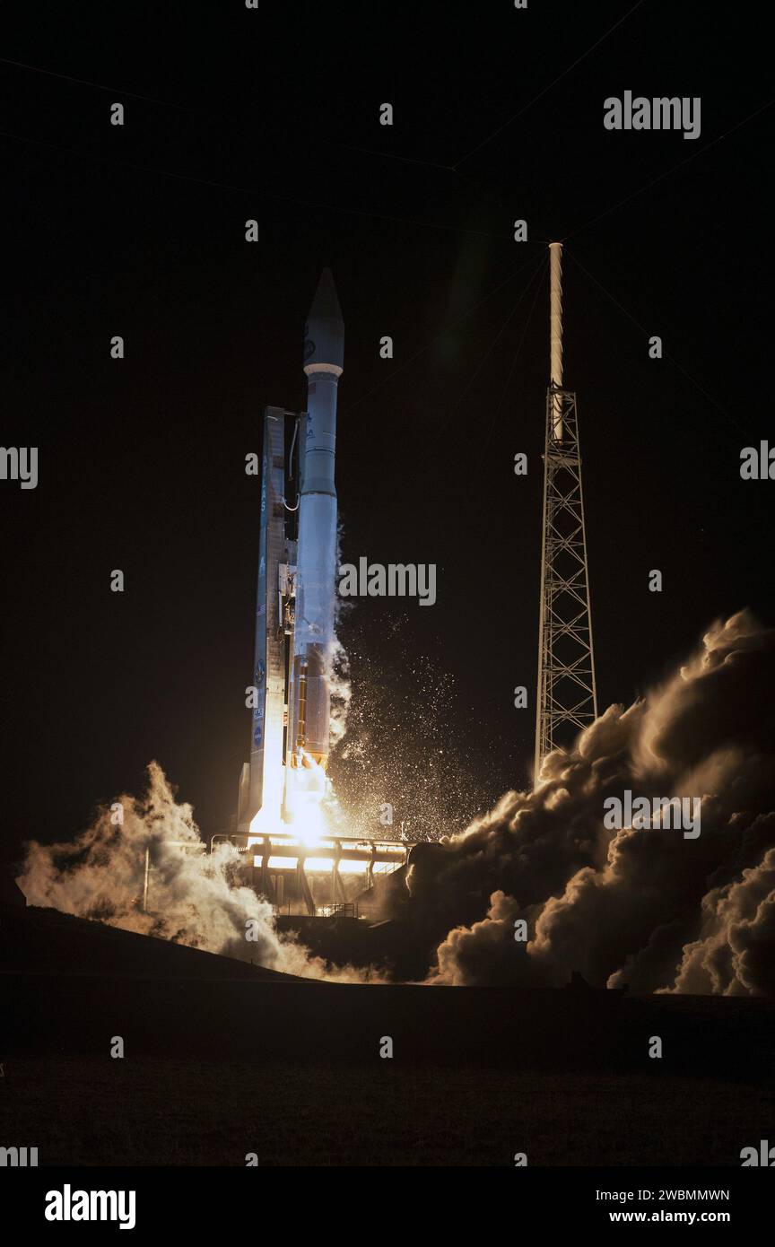 CAPE CANAVERAL, Fla. -- A cloud of exhaust and smoke billows past a ...