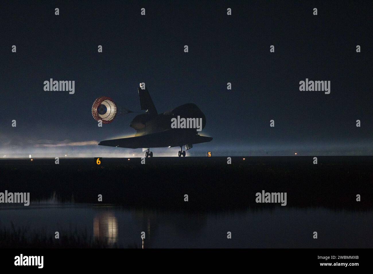 CAPE CANAVERAL, Fla. -- Space shuttle Atlantis, trailed by its drag ...