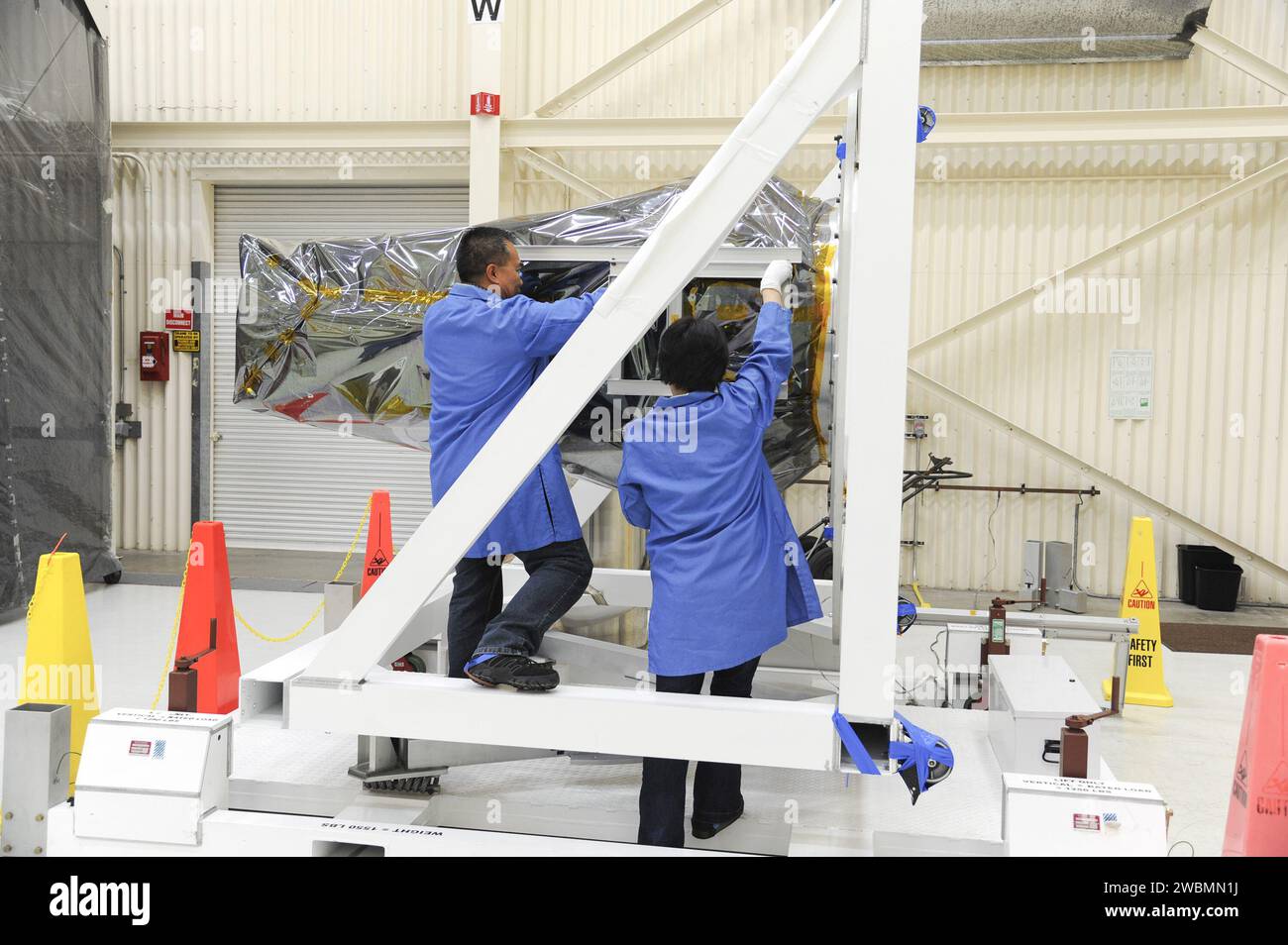 VANDENBERG AFB, Calif. – Technicians begin processing NASA's IRIS ...