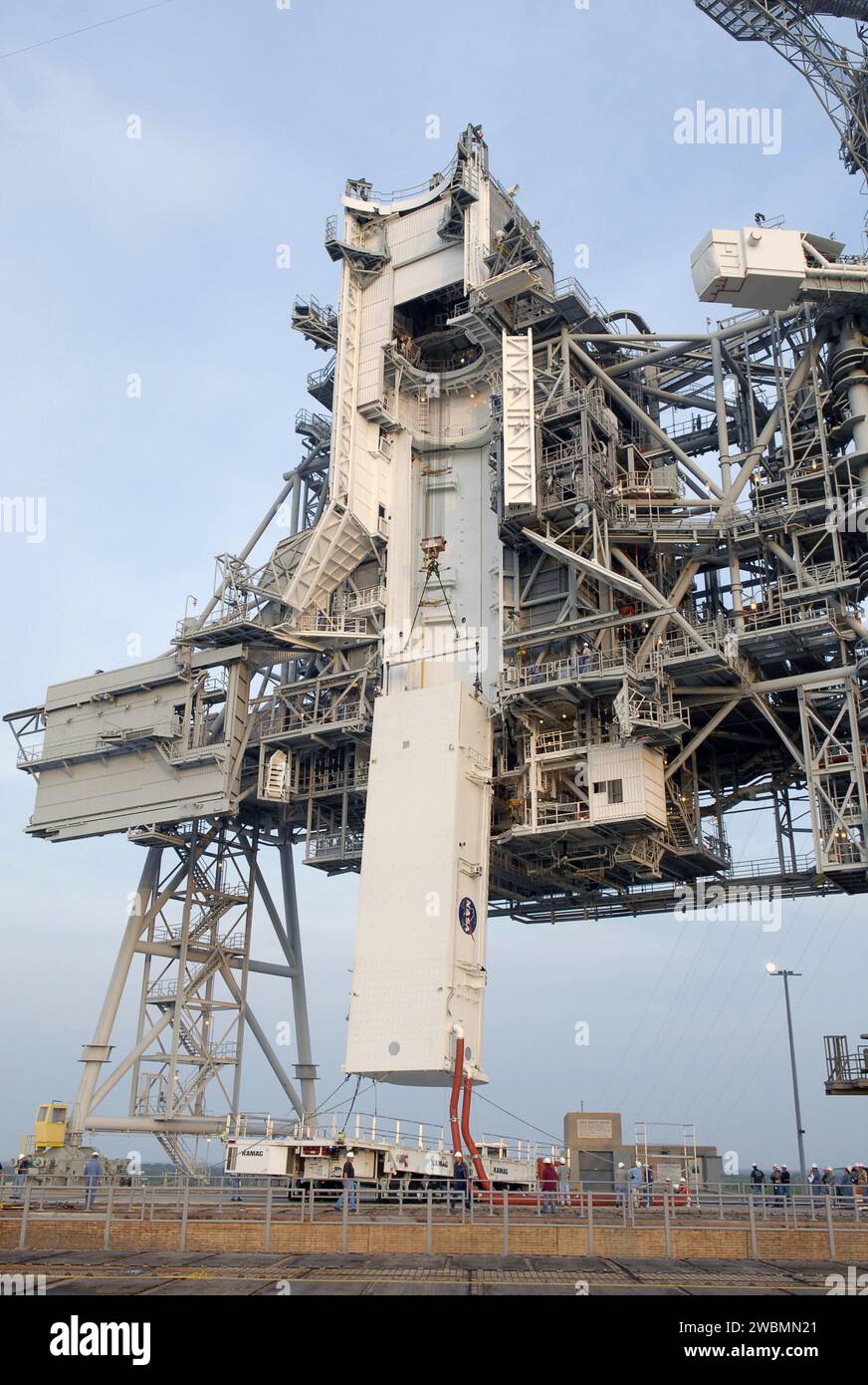 KENNEDY SPACE CENTER, FLA. -- The payload canister is lifted off its ...