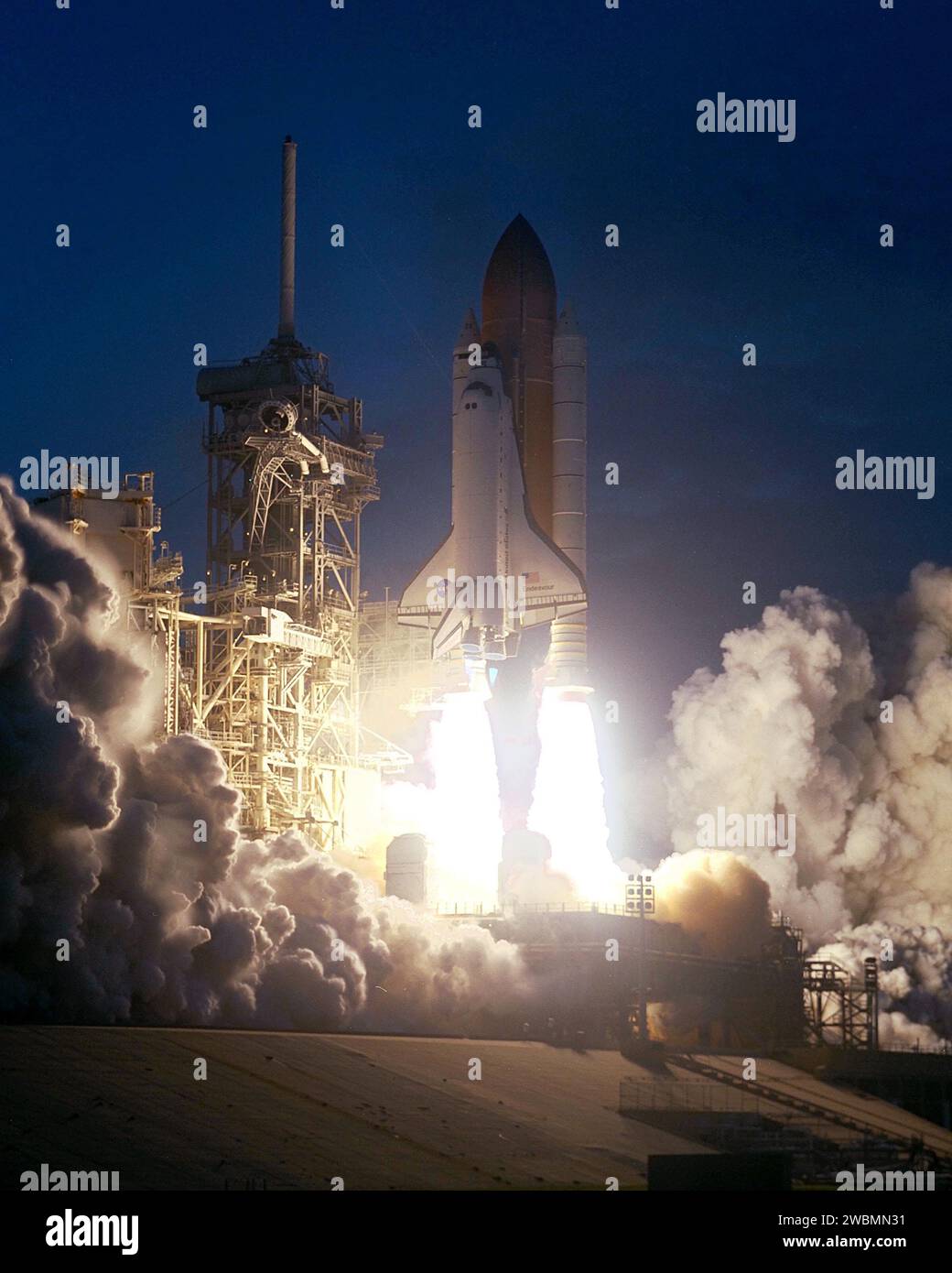 KENNEDY SPACE CENTER, Fla. -- Space Shuttle Endeavour soars into a twilight sky on mission STS ...