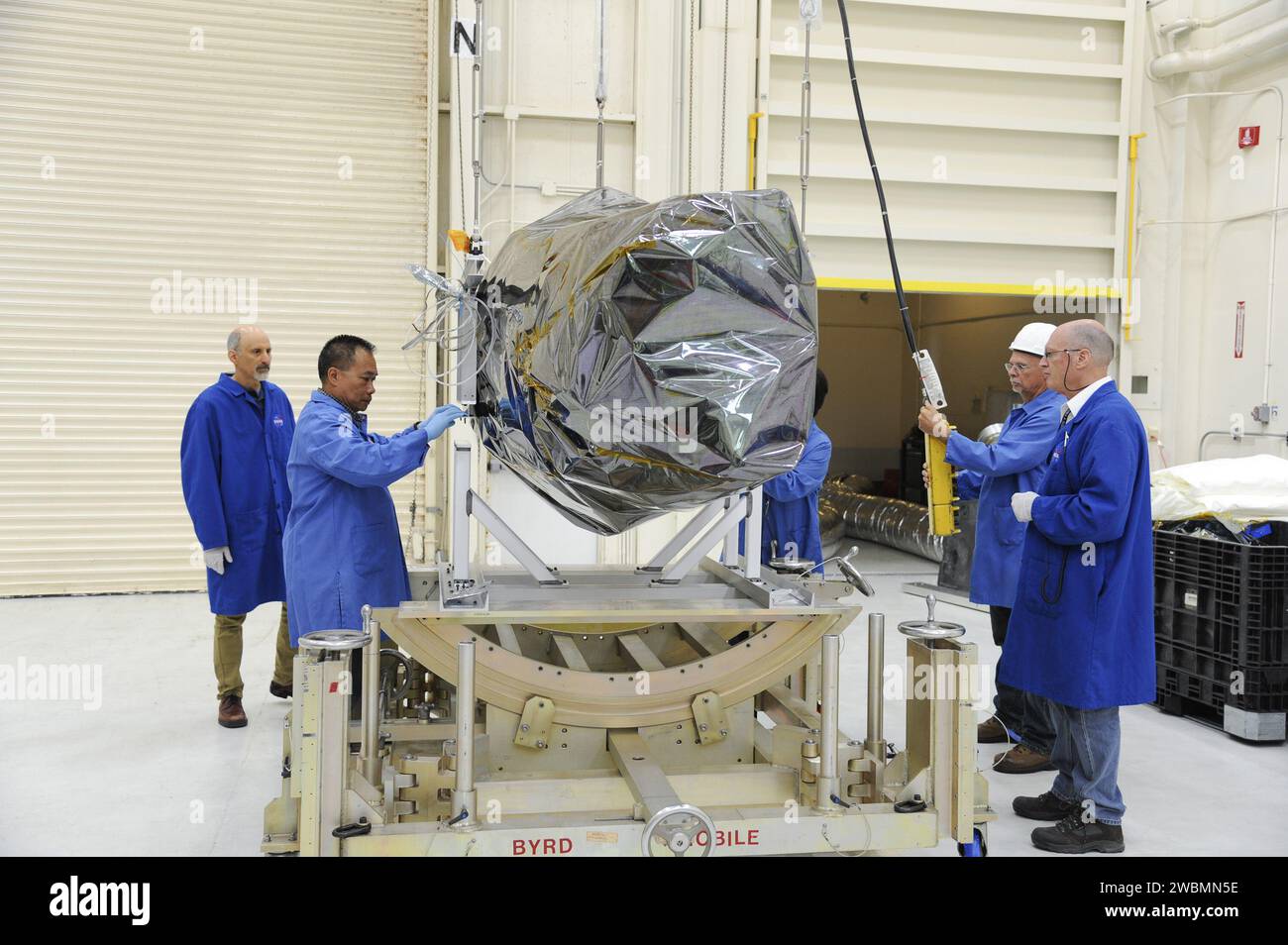 VANDENBERG AFB, Calif. – Technicians connect NASA's IRIS spacecraft to ...