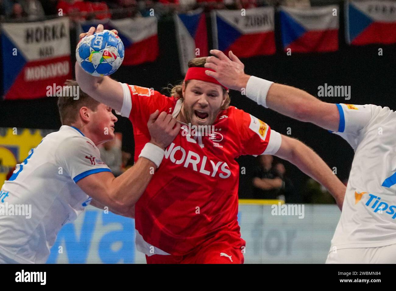 Denmark's Mikkel Hansen, center, shoots to score during the Men's ...