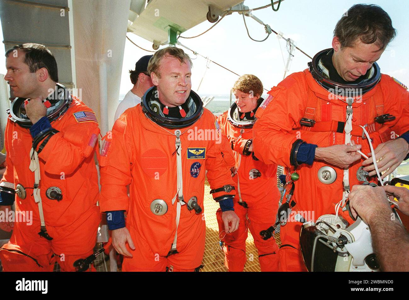 At the 195-foot level on the Fixed Service Structure, Launch Pad 39B, members of the STS-102 ...