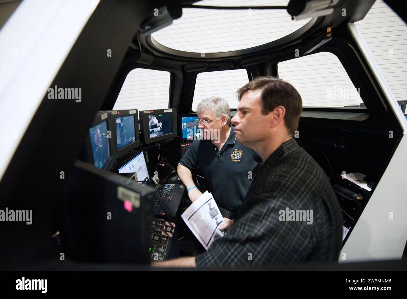 JSC2011-E-028163 (23 March 2011) --- NASA astronauts Greg Chamitoff ...