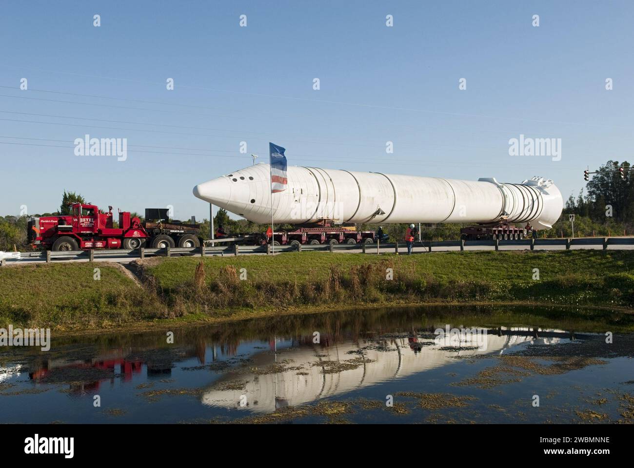 CAPE CANAVERAL, Fla. – A truck hauls a full-size, 149-foot-long, space ...