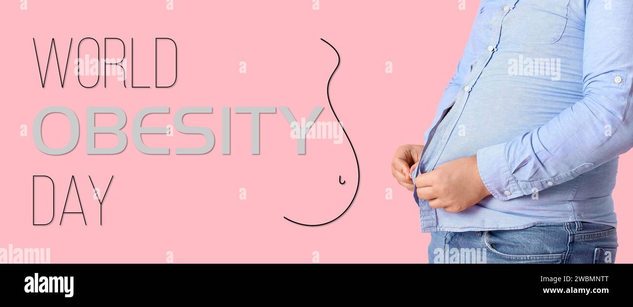 Overweight man in tight shirt on pink background. World Obesity Day ...