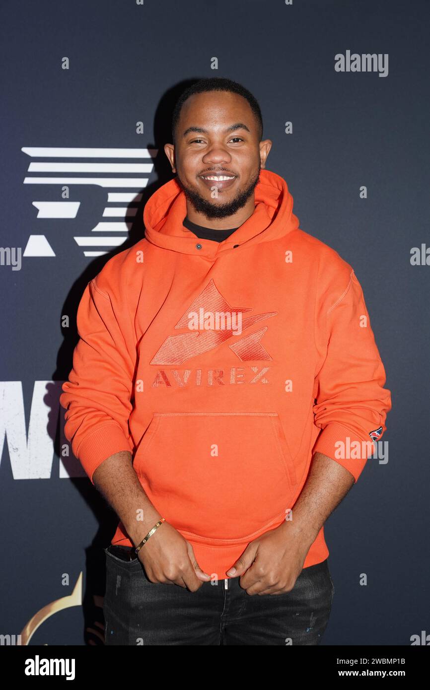Theo Johnson attends the premiere of Lawrence, at the Odeon Luxe West ...