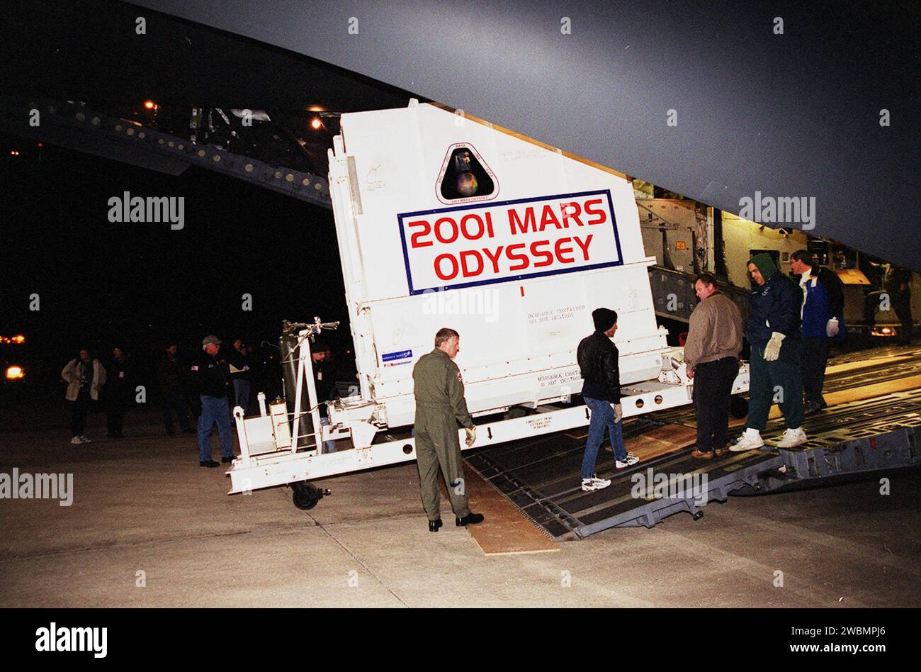 The Mars Odyssey spacecraft is removed from the Air Force C-17 cargo ...