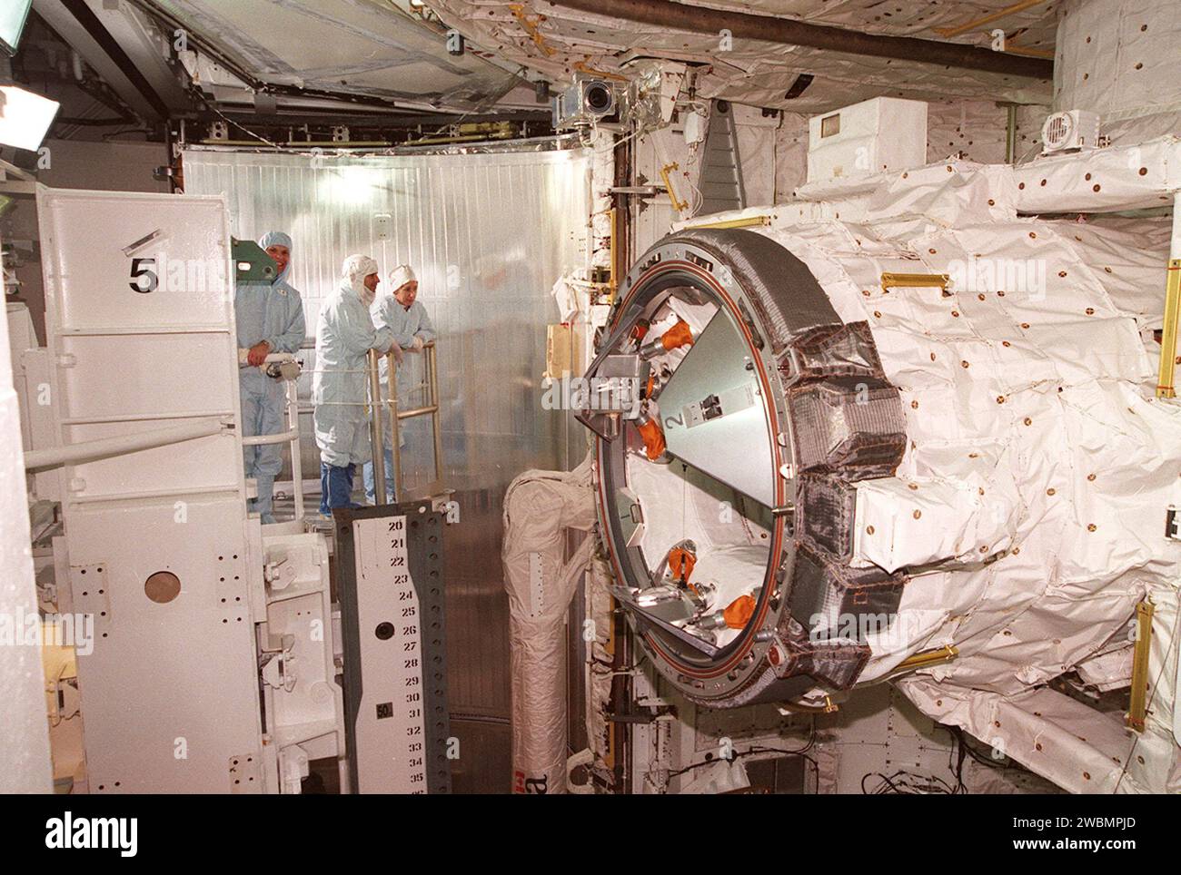 KENNEDY SPACE CENTER, FLA. -- Members of the STS-98 crew, along with Scott Thurston (left), with ...