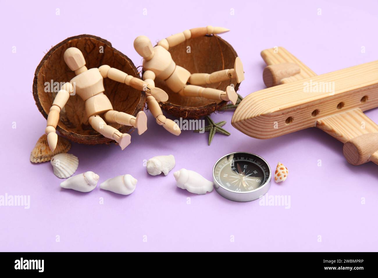 Composition with wooden plane, compass and mannequins sitting in ...