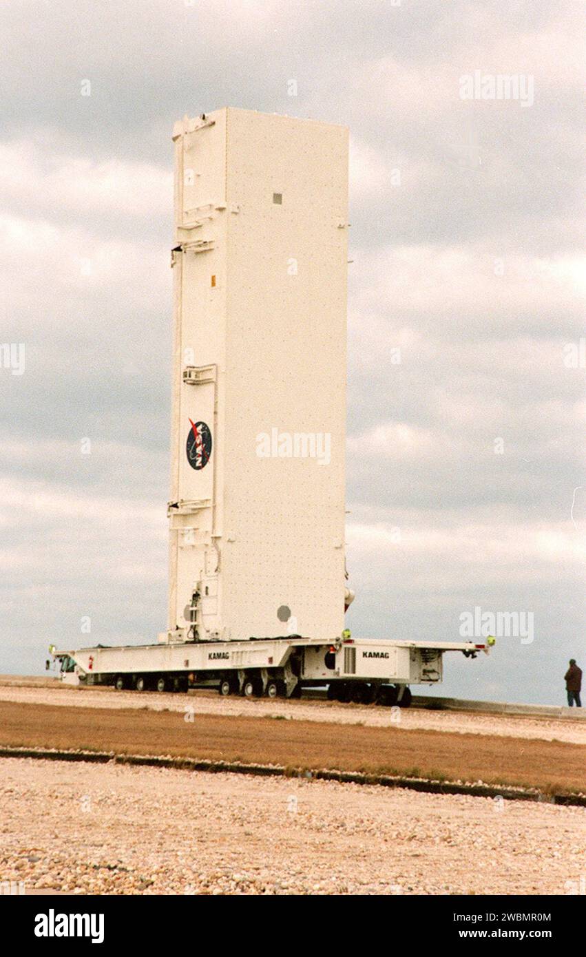 KENNEDY SPACE CENTER, FLA. -- An empty payload canister moves slowly to ...