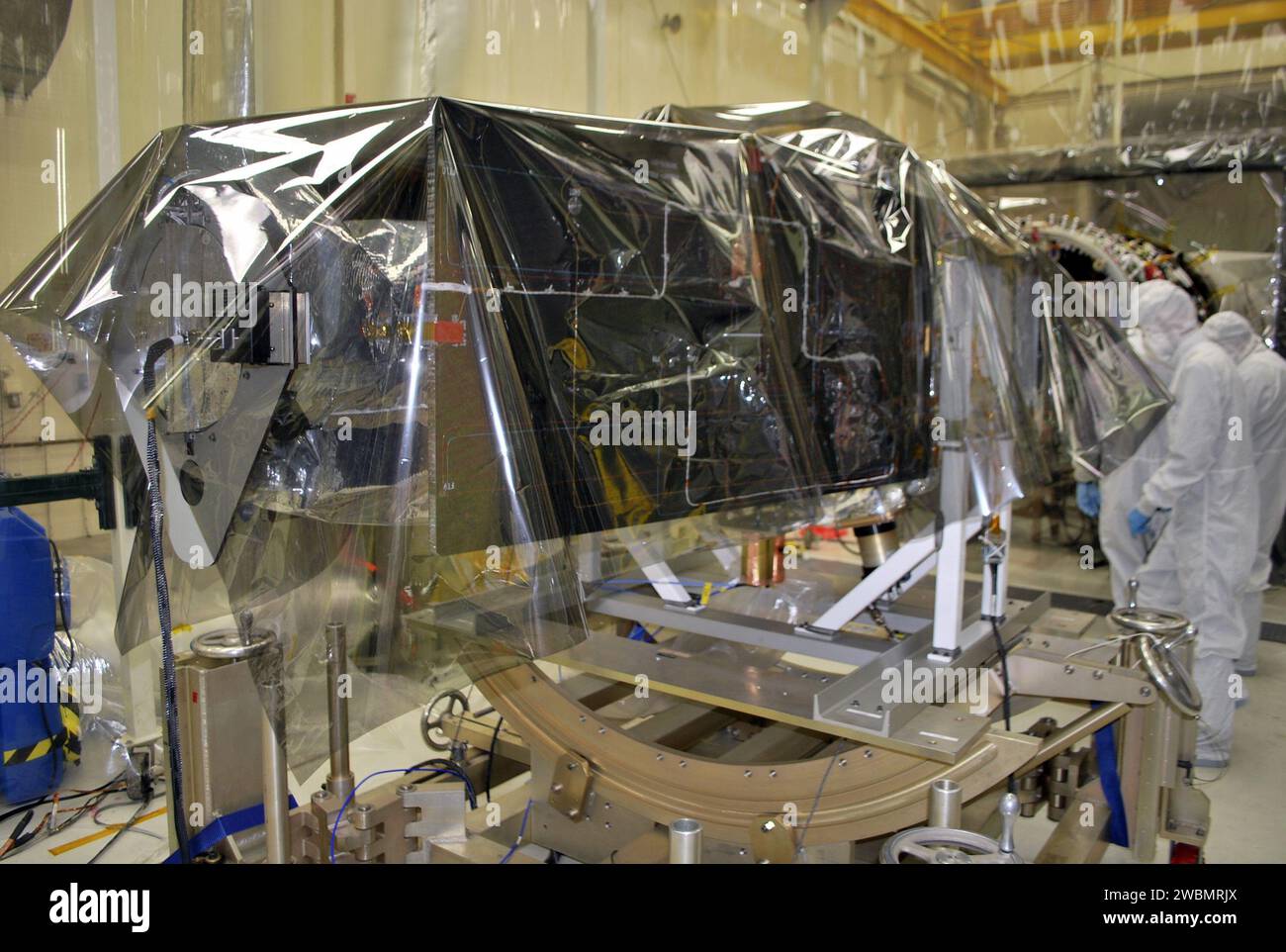 VANDENBERG AFB, Calif. – Technicians process NASA's IRIS spacecraft for ...