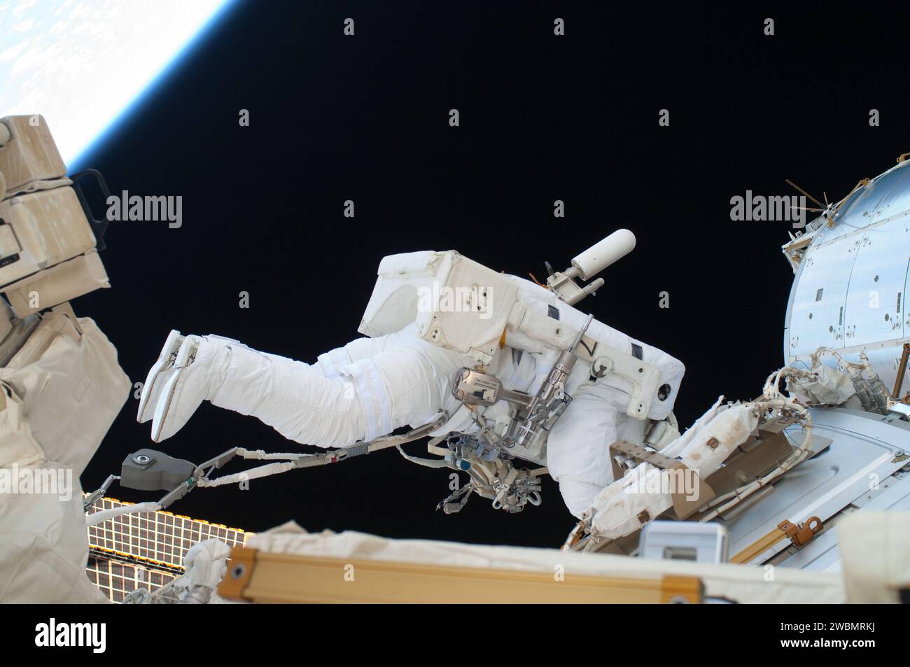 NASA astronaut Ron Garan, Expedition 28 flight engineer, performs tasks ...
