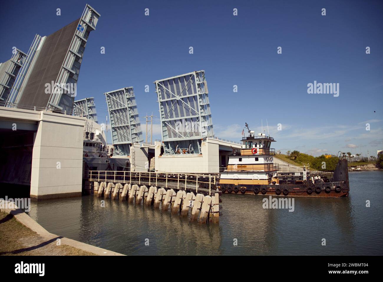 CAPE CANAVERAL, Fla. – A tugboat pulls the Pegasus Barge through a ...