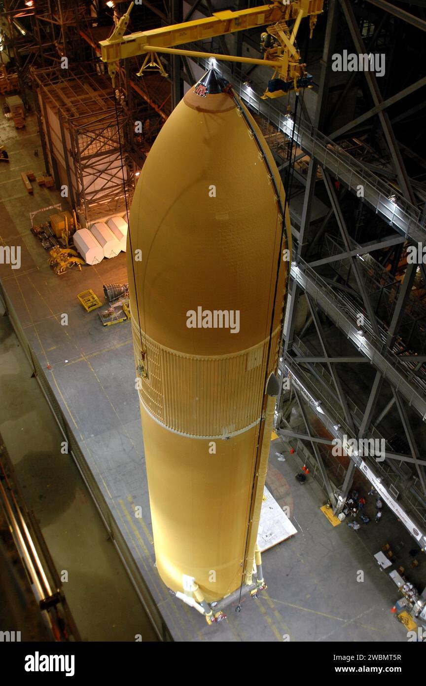 The redesigned External Tank is lifted into the checkout cell at ...