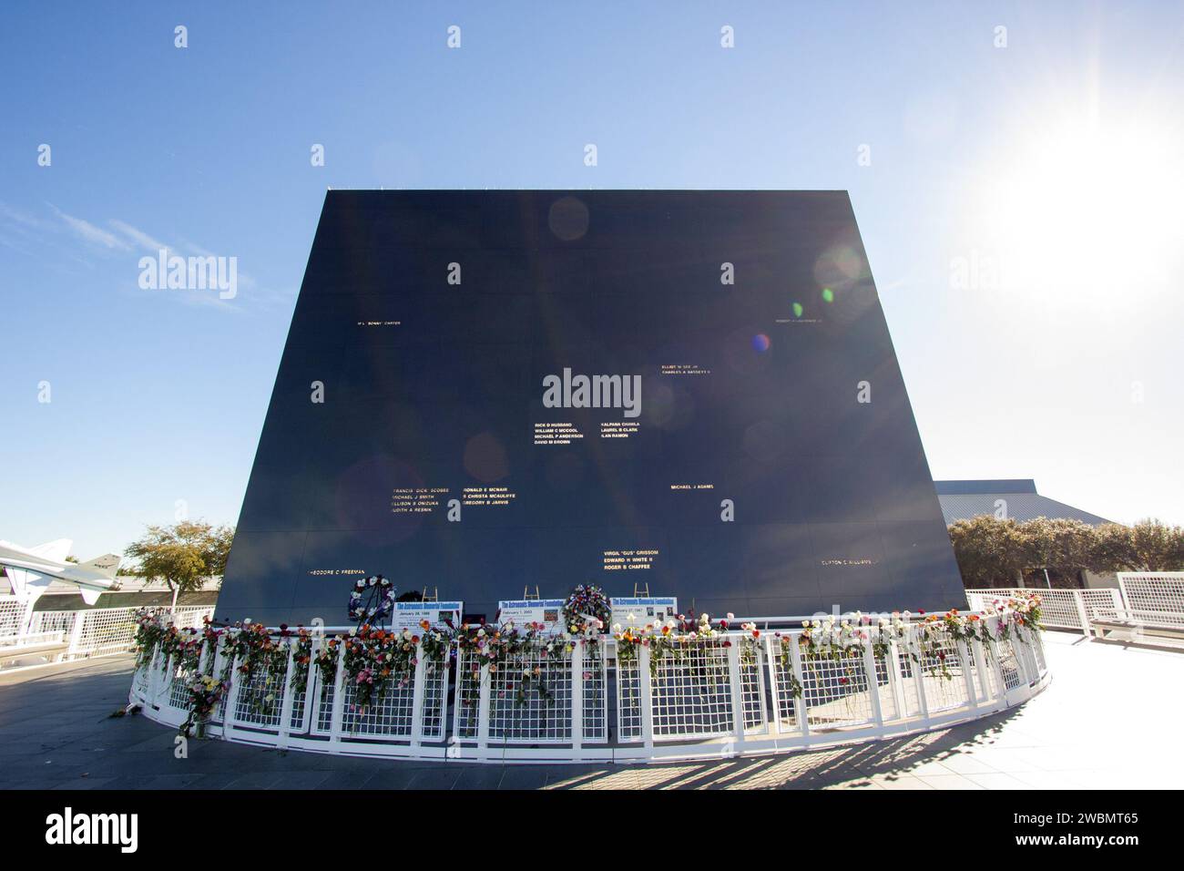 CAPE CANAVERAL, Fla. -- Kennedy Space Center Employees and guests placed wreaths and flowers at ...