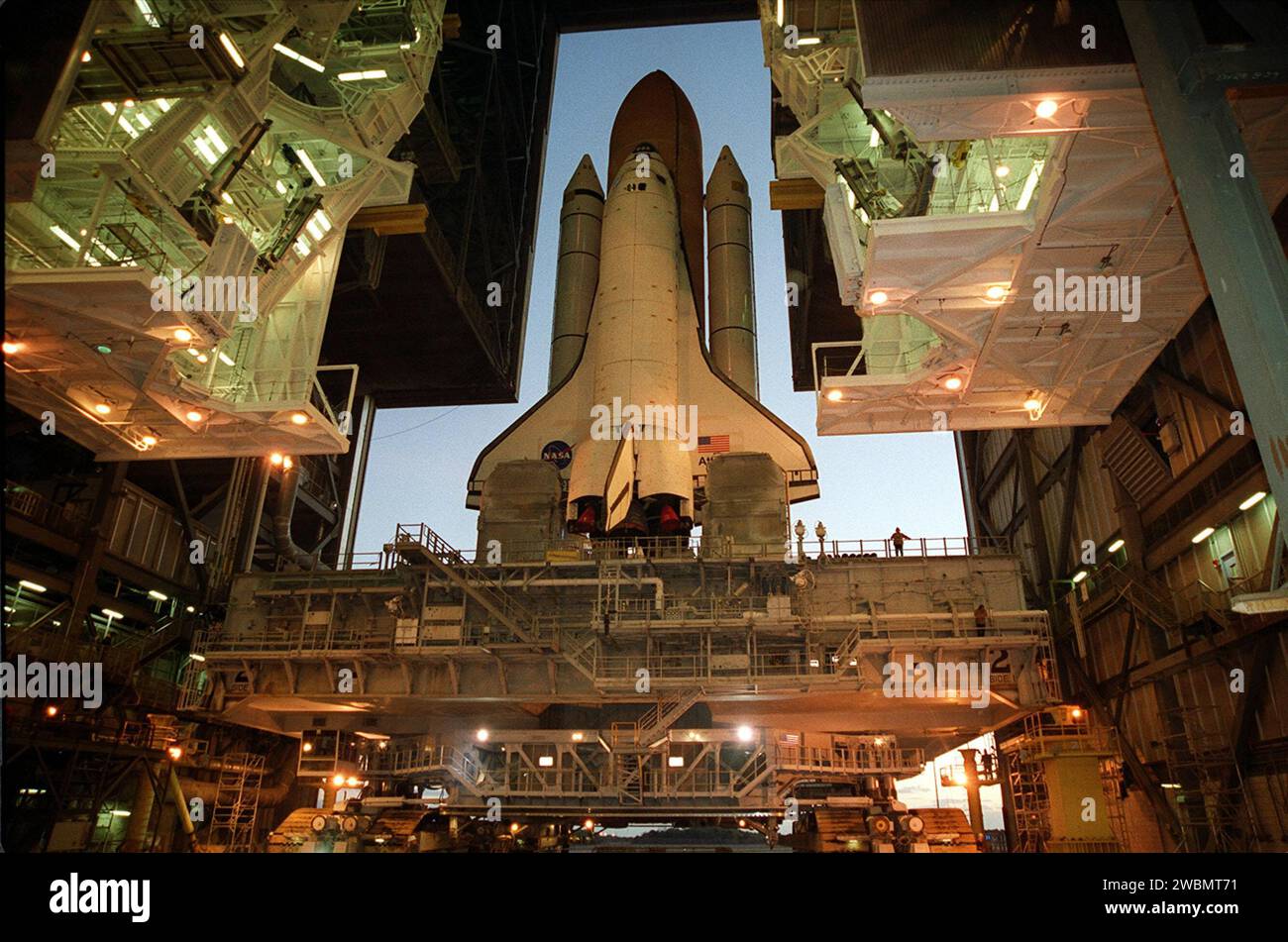 KENNEDY SPACE CENTER, Fla. -- Space Shuttle Atlantis begins rolling out ...