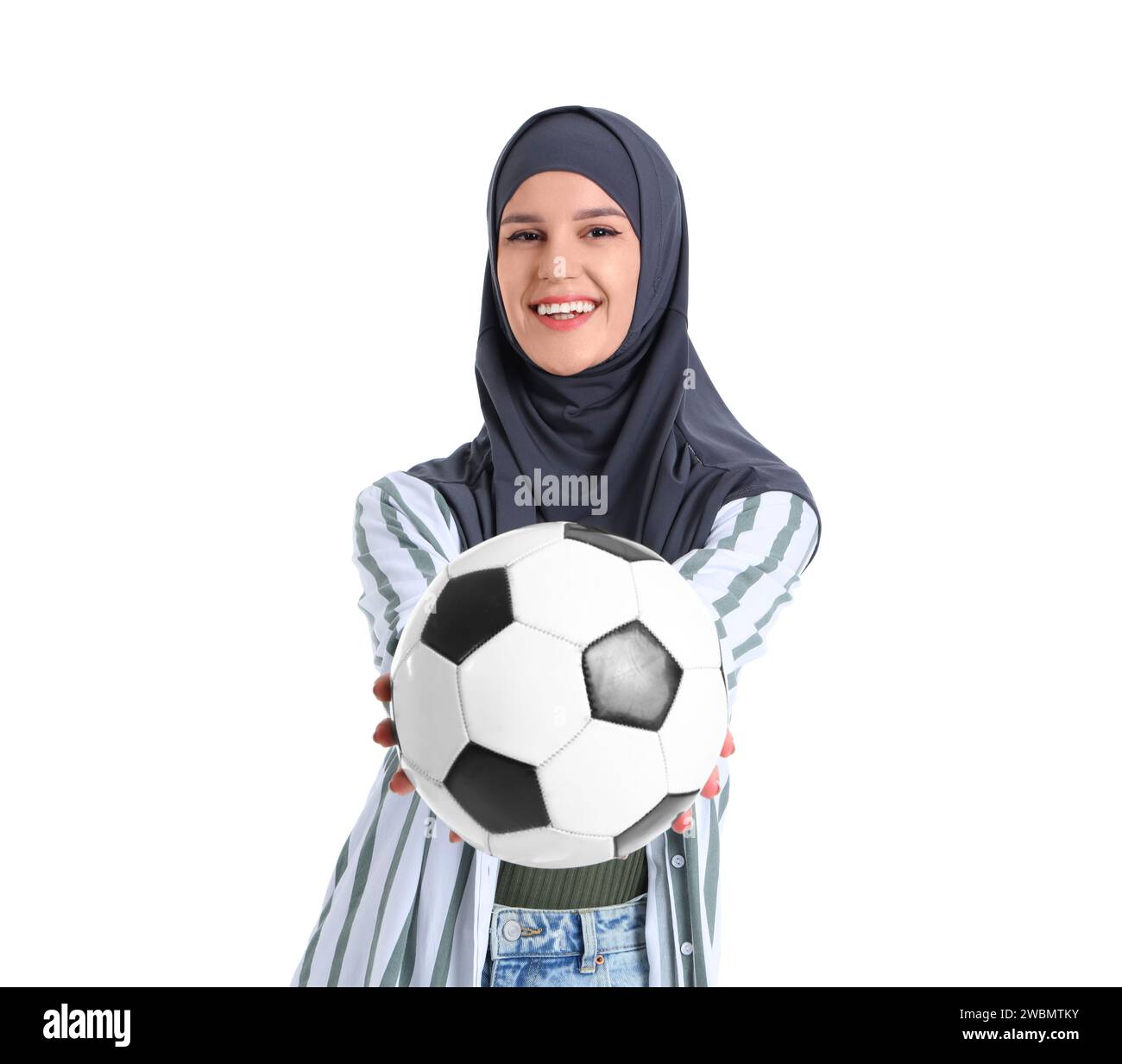 Young Muslim woman with soccer ball on white background Stock Photo - Alamy