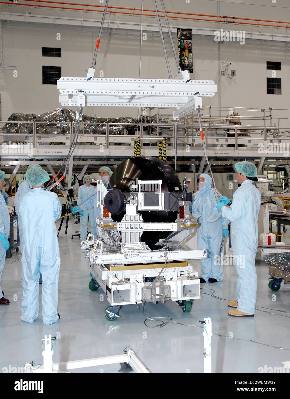 Technicians at Kennedy Space Center's Space Station Processing Facility ...