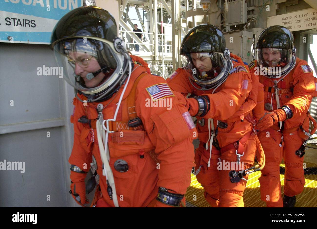 KENNEDY SPACE CENTER, FLA. -- STS-110 crew members practice emergency exit from the Fixed ...