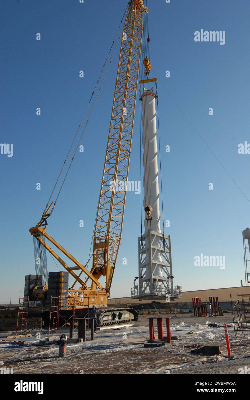 At NASA's Kennedy Space Center Launch Pad 39B in Florida, a crane ...