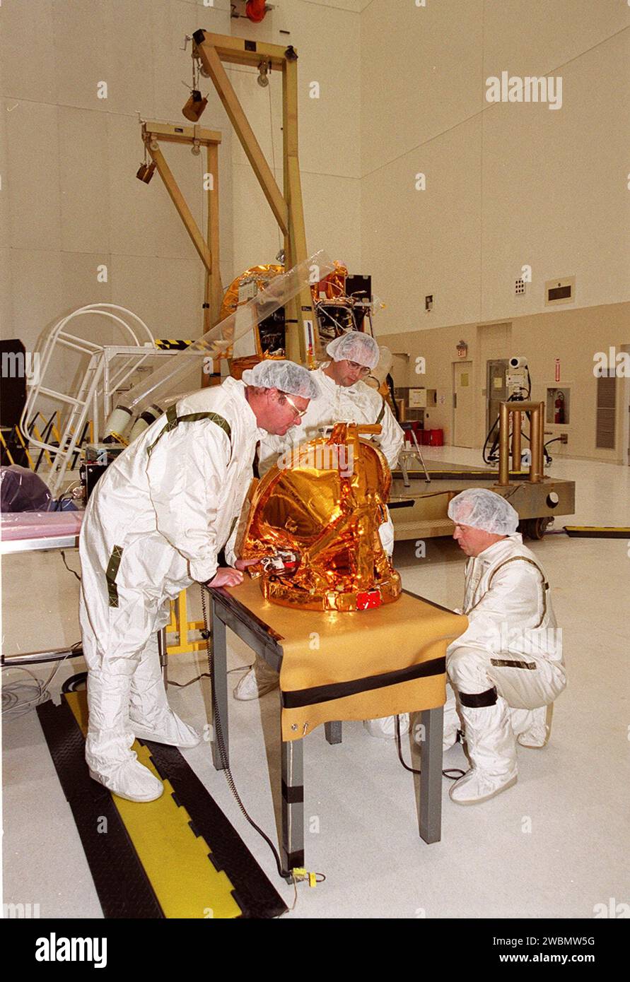 Technicians check out the Gamma Ray Spectrometer (GRS) before it is ...