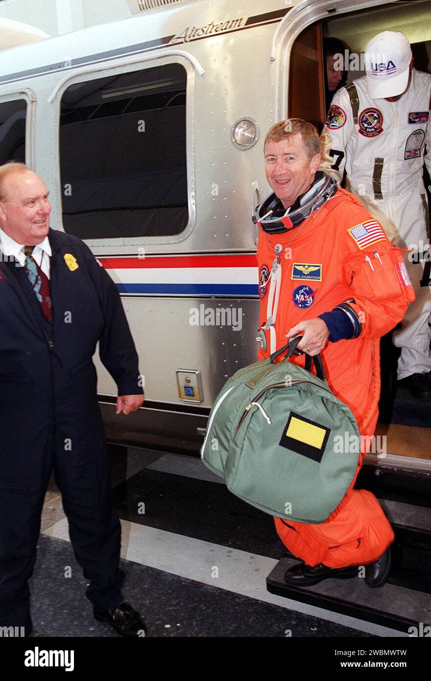 After a 24-hour STS-105 launch delay, Commander Frank Culbertson exits ...