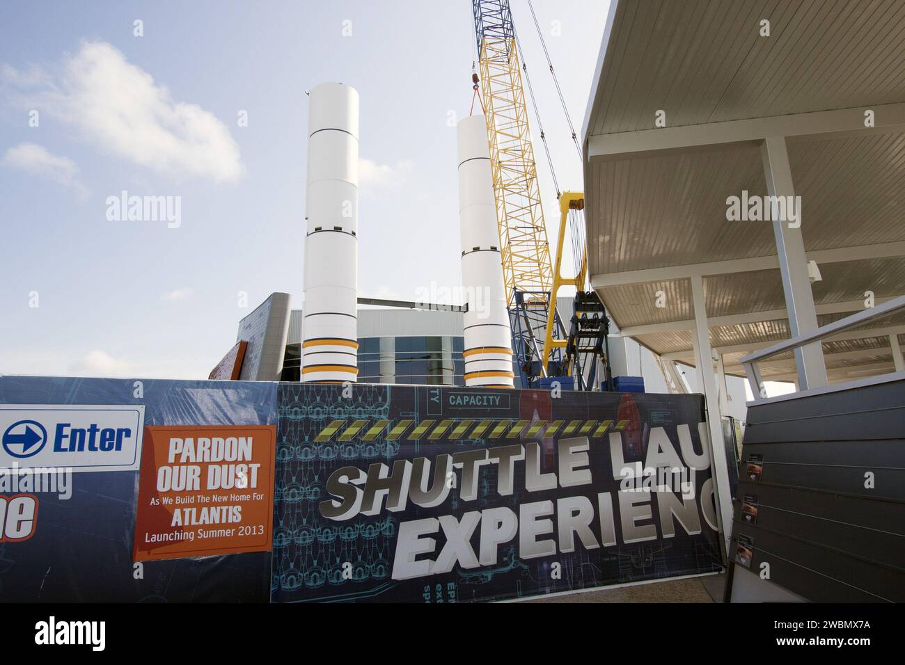 CAPE CANAVERAL, Fla. – A crane lifts a segment for a set of twin, full ...