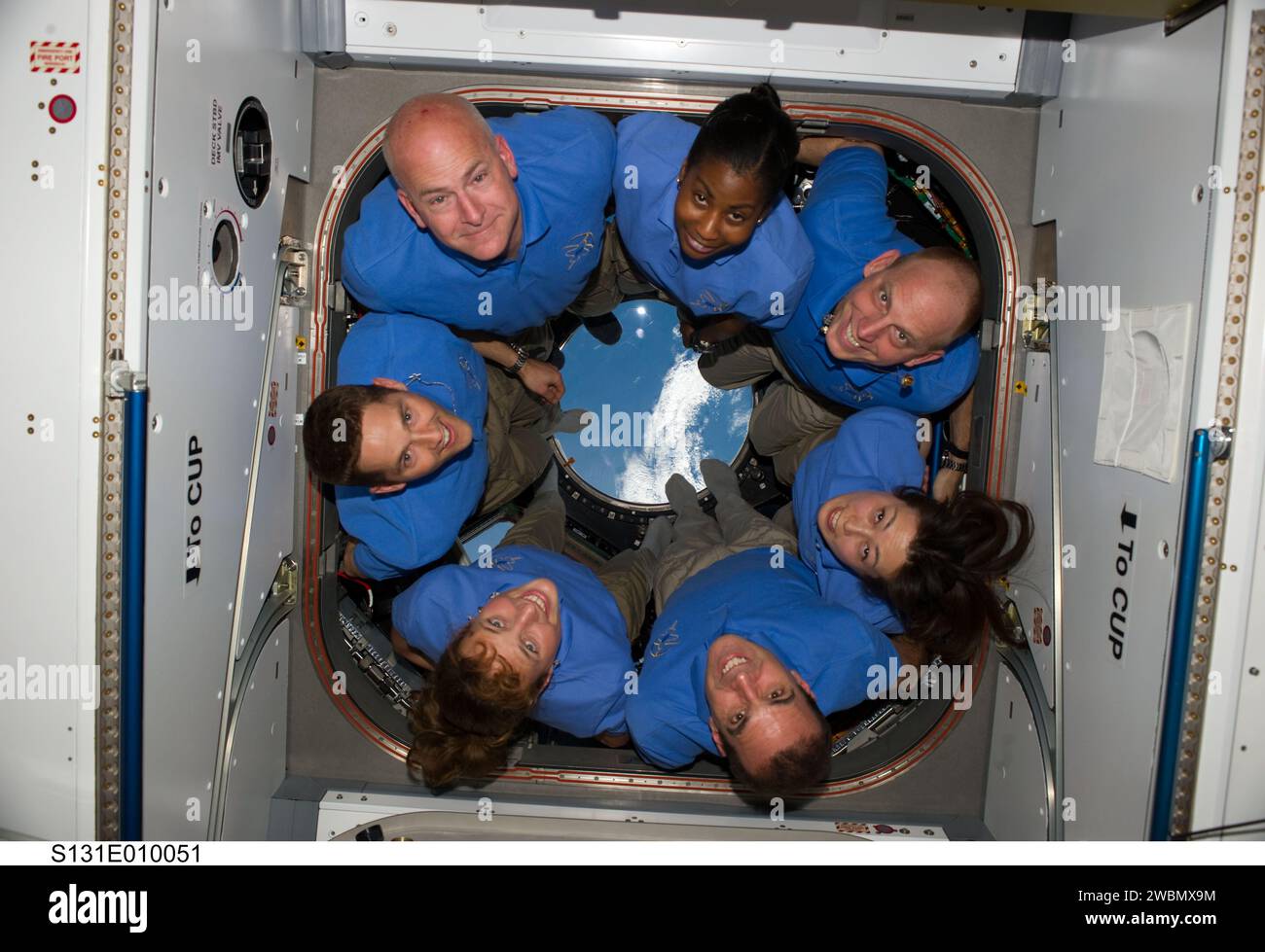 S131-E-010051 (14 April 2010) --- The STS-131 crew members pose for a ...
