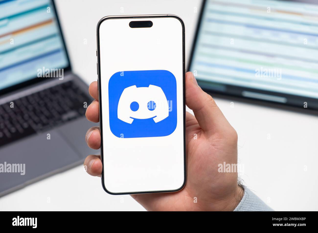 Discord logo of social media application on the screen of smart phone ...