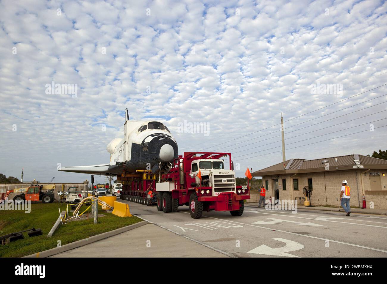 The transporter moves the full-scale high-fidelity space shuttle model ...