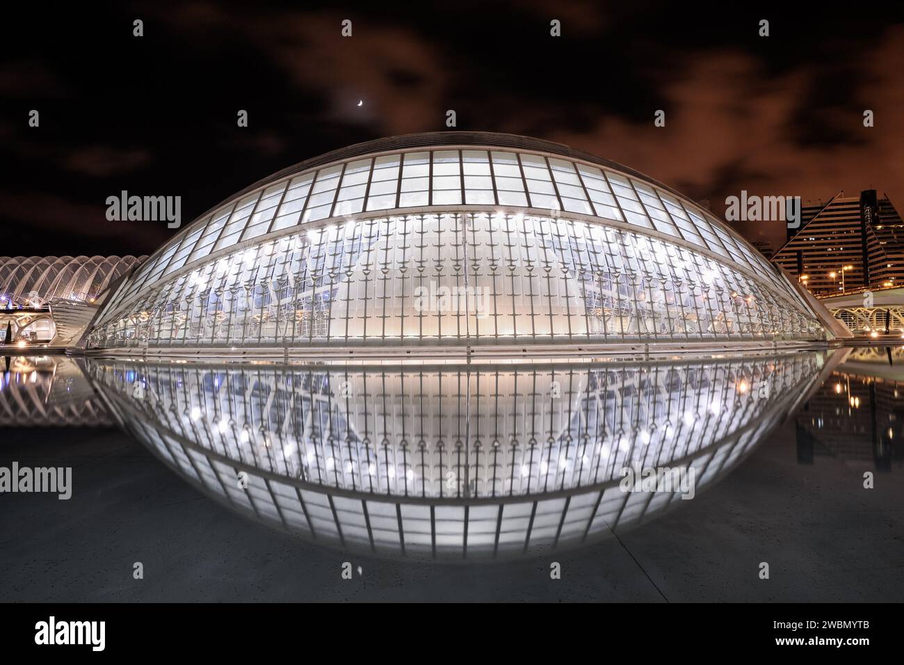 Side view of the Hemisferic at night, in the City of Arts and Sciences ...