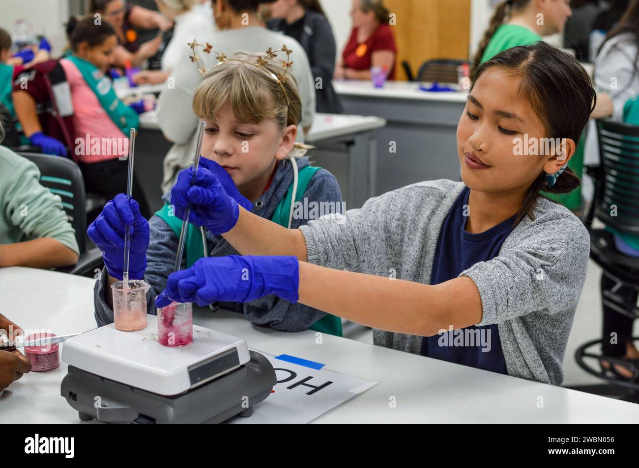 jsc2021e037279 (11/15/2019) --- Girl Scouts prepare experiments as part of a STEM collaboration ...