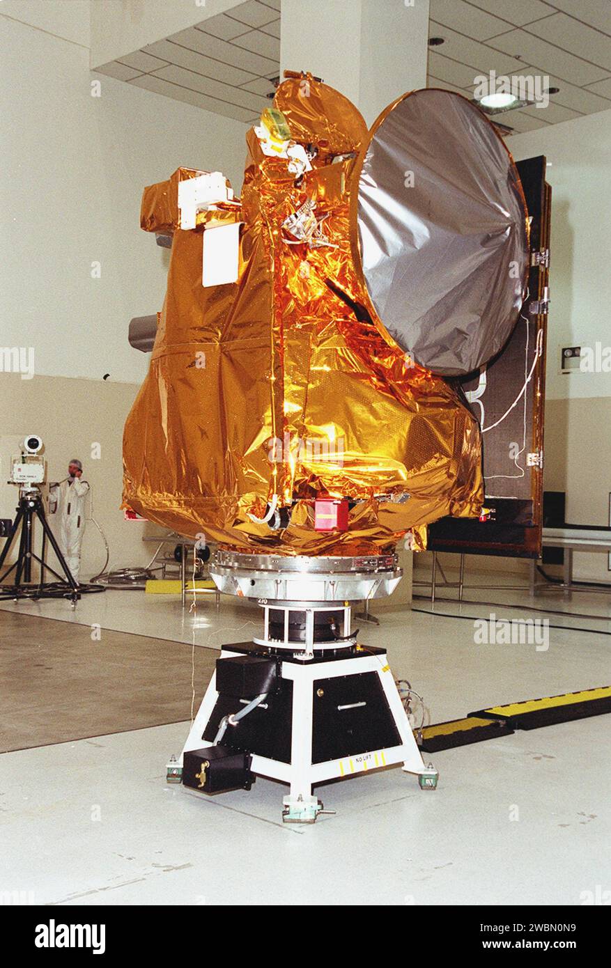 The 2001 Mars Odyssey Orbiter rests on the spin table in the Space ...