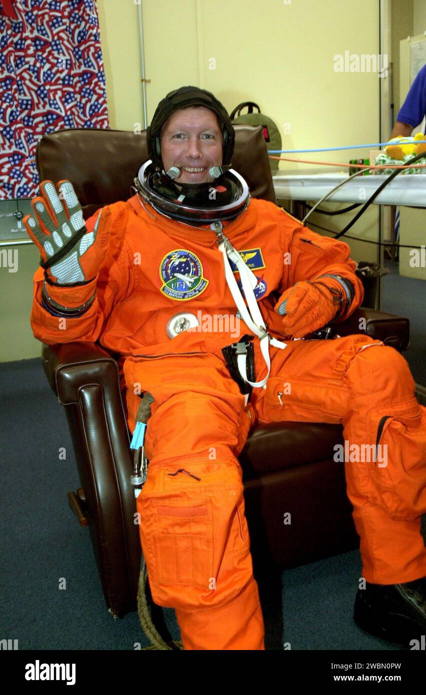 KENNEDY SPACE CENTER, Fla. -- STS-108 Commander Dominic L. Gorie gets a ...